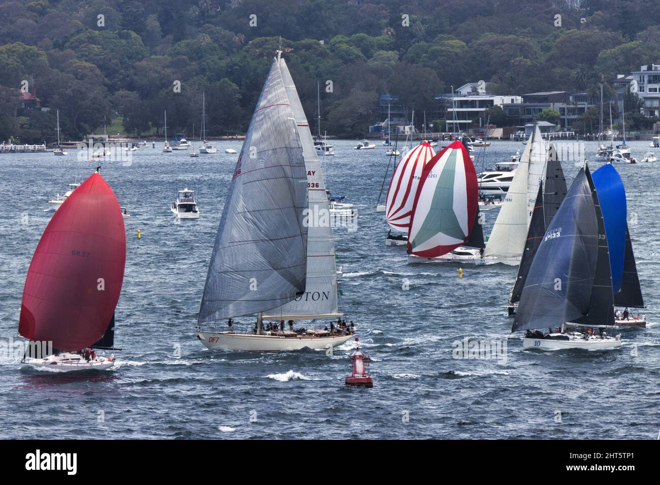 Small yachts racing on Sydney Harbour during the 2021 Sydney to Hobart ...