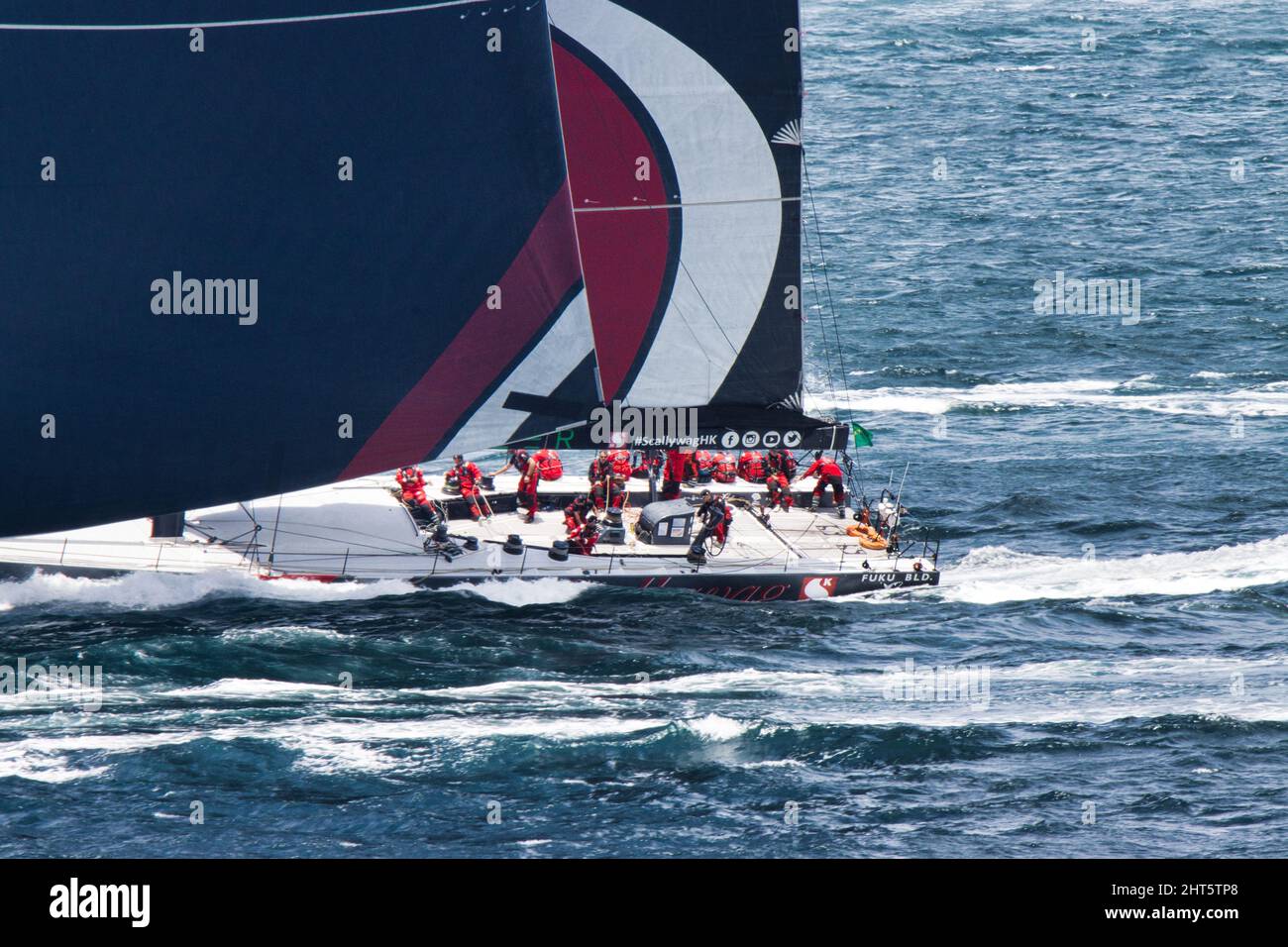 Yacht crew racing on Sydney Harbour during the 2021 Sydney to Hobart ...
