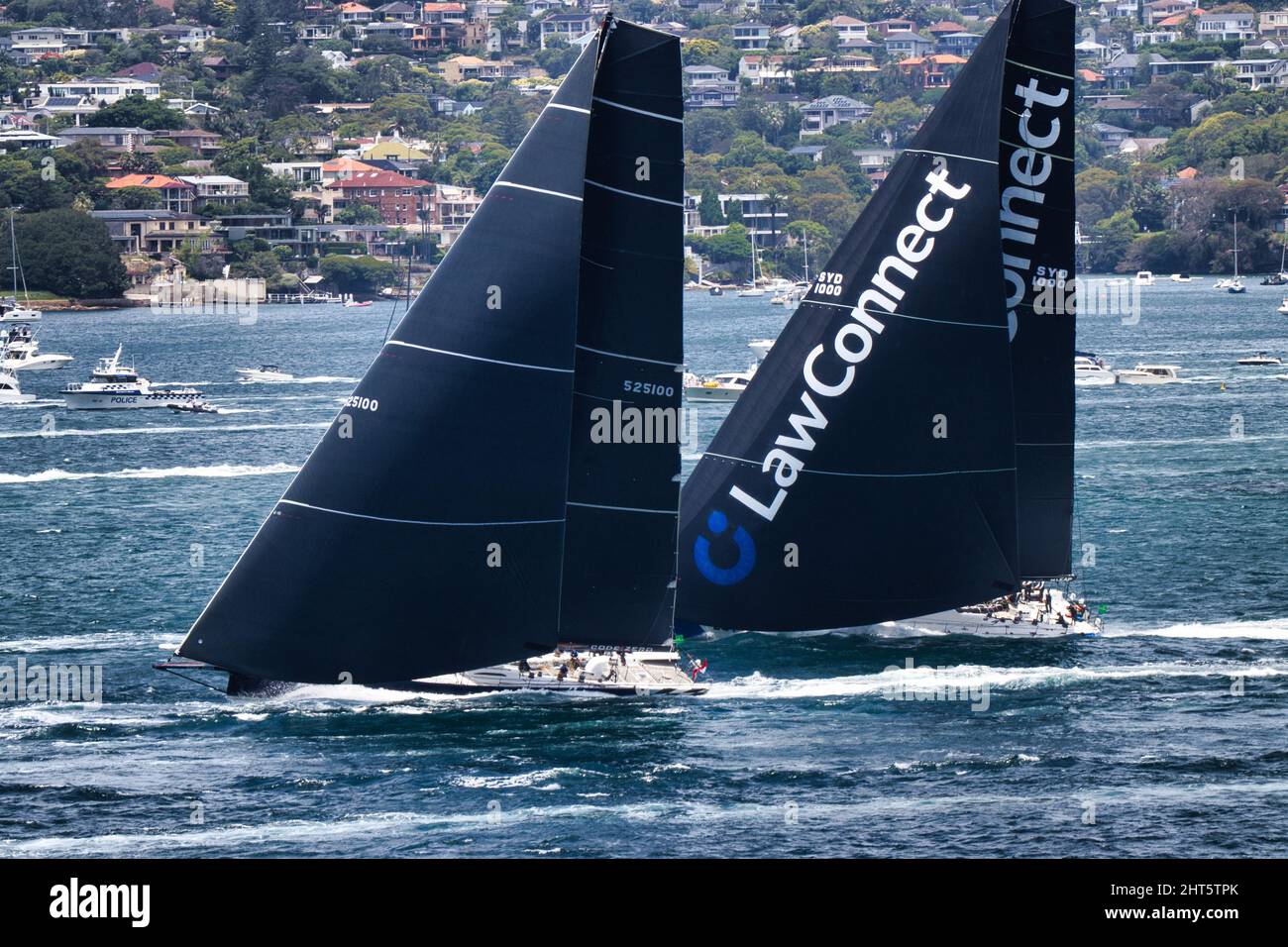 Two yachts racing on Sydney Harbour during the 2021 Sydney to Hobart ...
