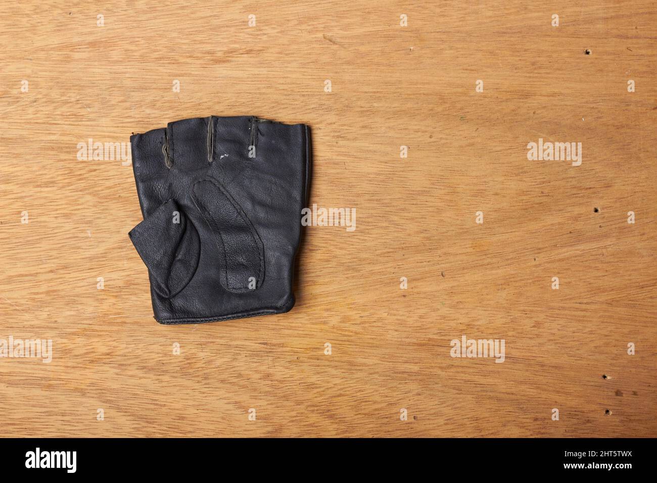 Black leather fingerless gloves hi-res stock photography and images - Alamy