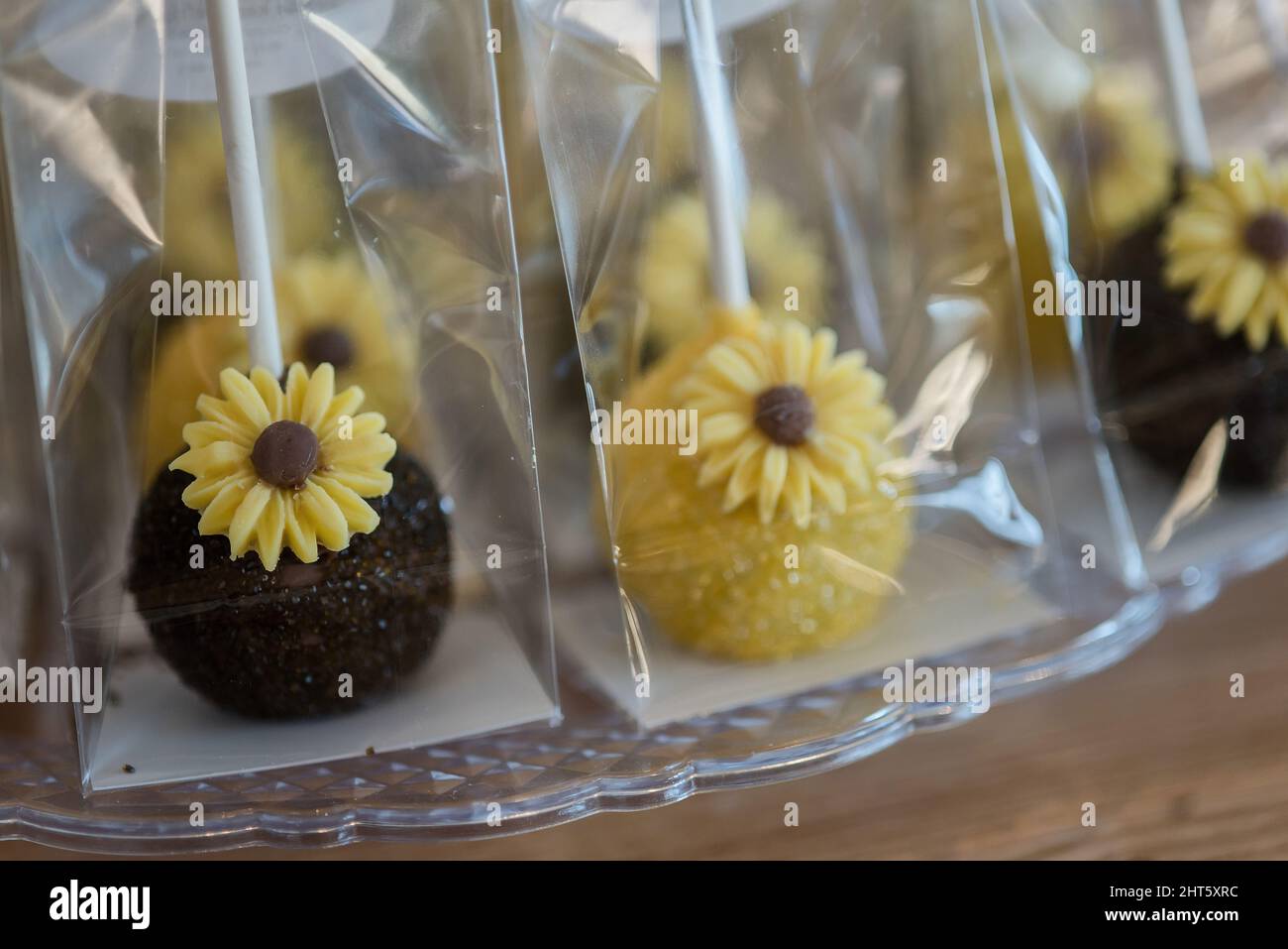 Closeup shot of round chocolates and desserts with a form of a flower ...