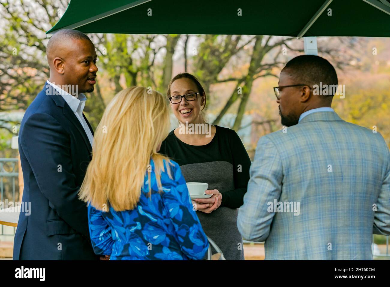 VIP guests mingling at outdoor social event in Johannesburg, South ...