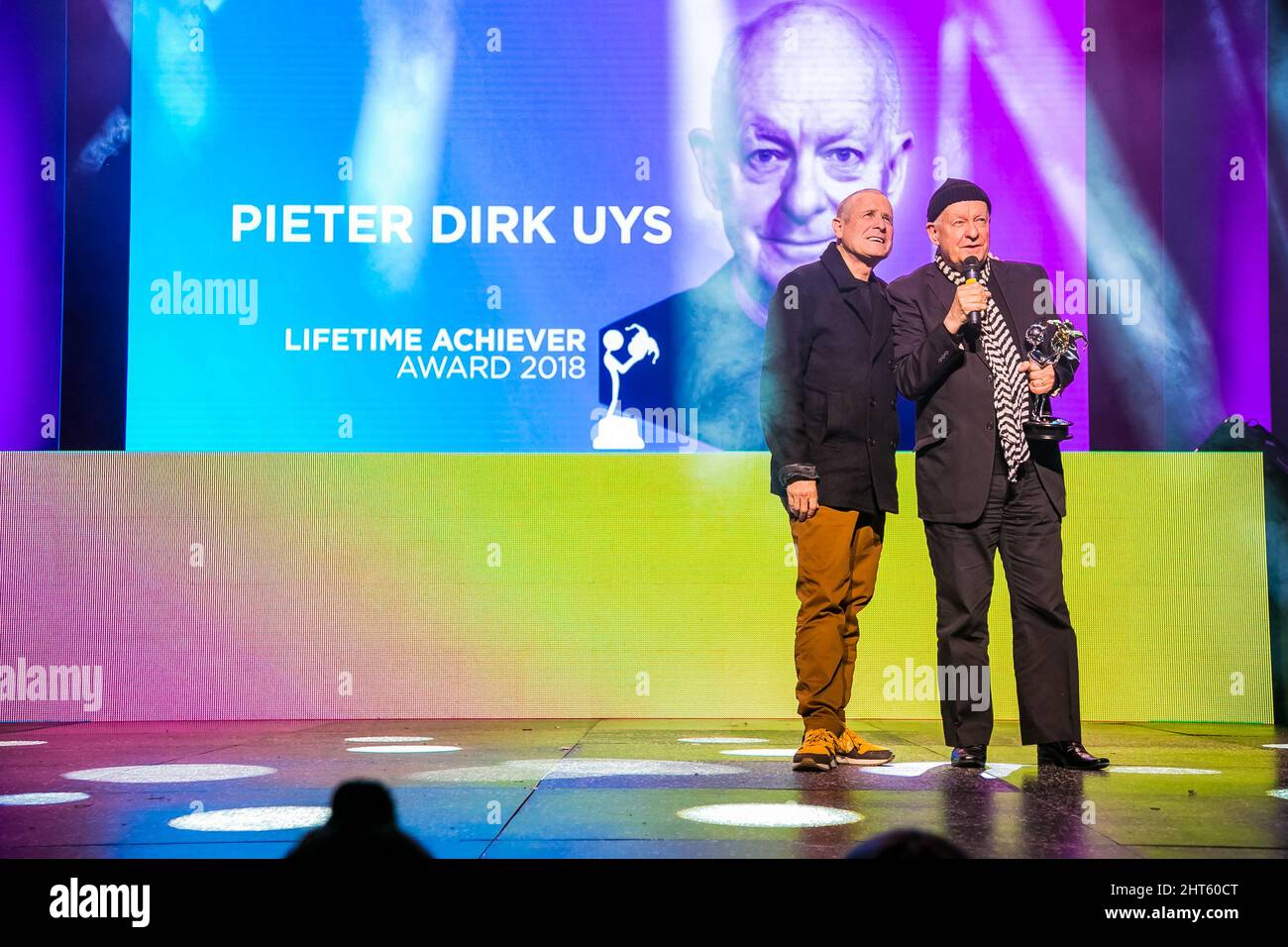 Pieter Dirk Uys receiving a lifetime achievement award from musical ...