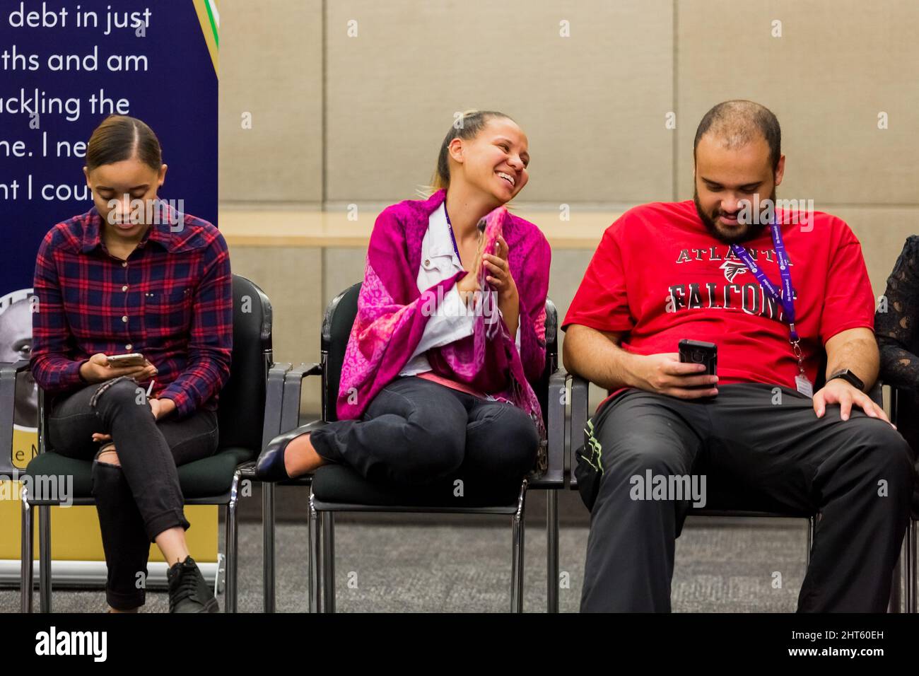 Diverse adult students attending a class on finance in Johannesburg ...