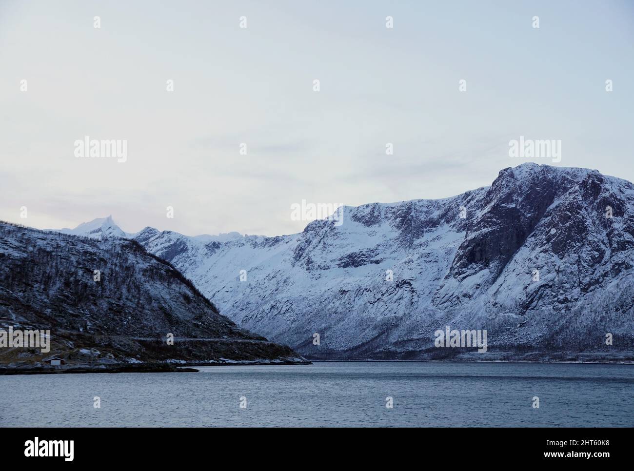 Stunning view of snowy mountains in Grotfjord, Norway Stock Photo - Alamy