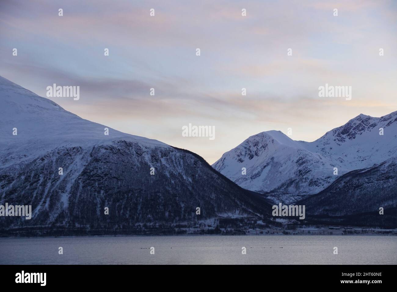 Stunning view of snowy mountains in Tromso, Norway Stock Photo - Alamy