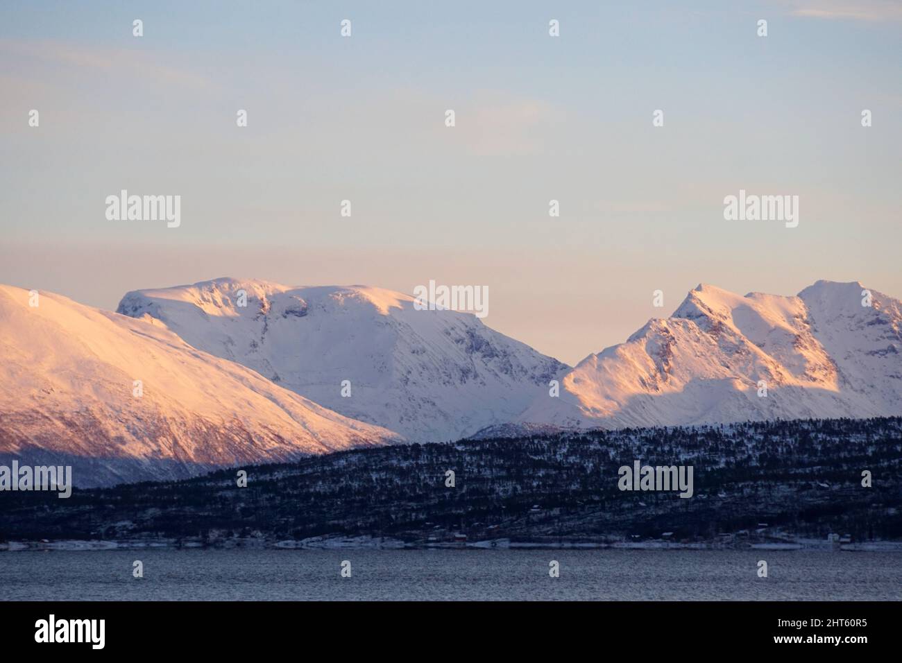 Stunning view of snowy mountains in Tromso, Norway Stock Photo - Alamy