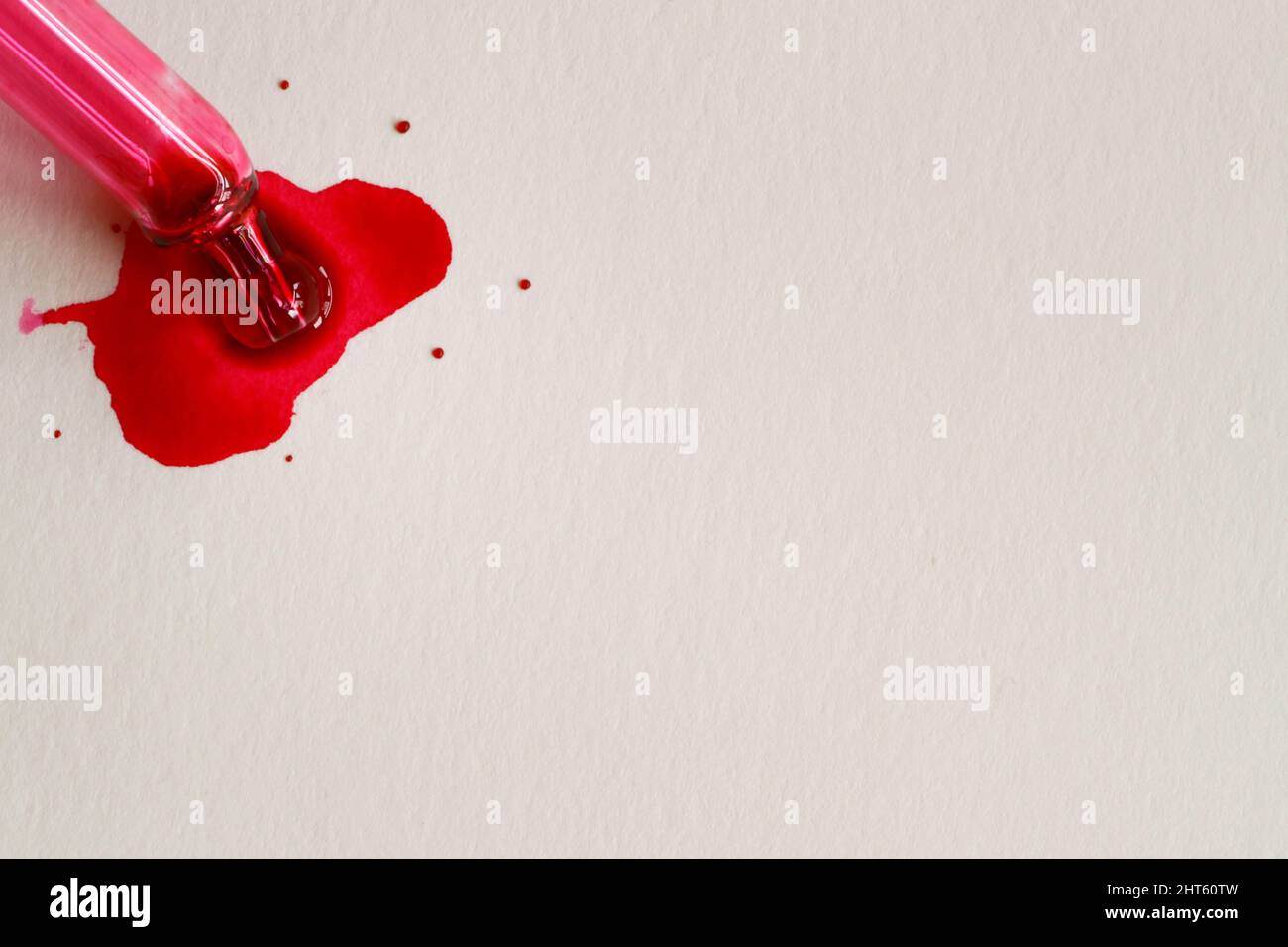 Top view of a red paint in a pipette on white background Stock Photo ...