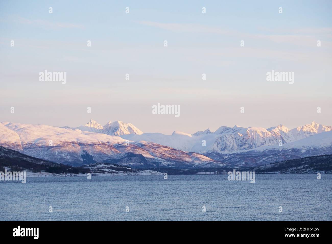 Stunning view of snowy mountains in Tromso, Norway Stock Photo - Alamy