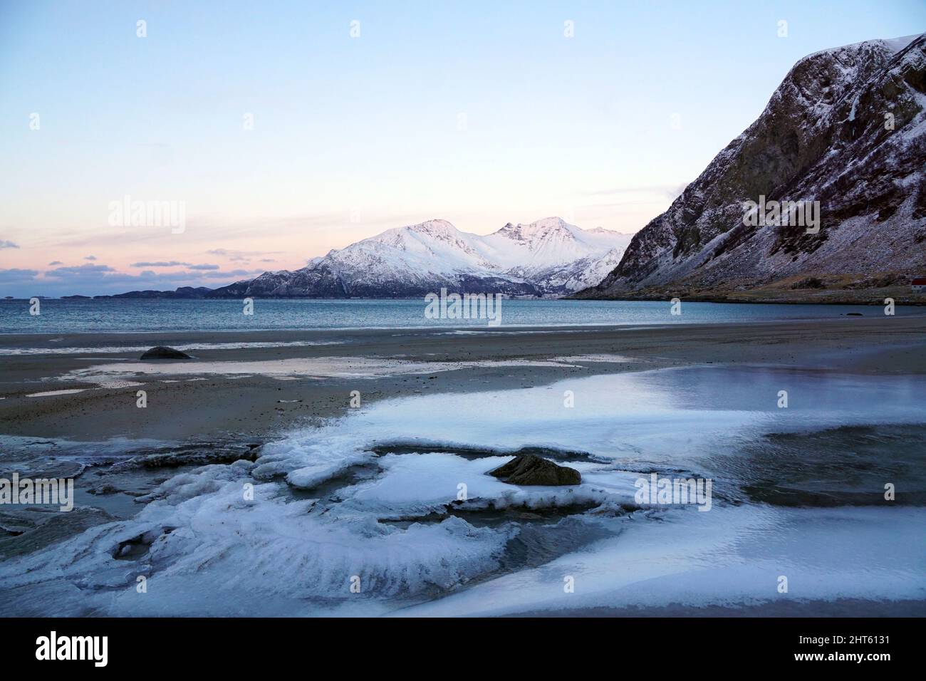 Stunning view of snowy mountains in Grotfjord, Norway Stock Photo - Alamy