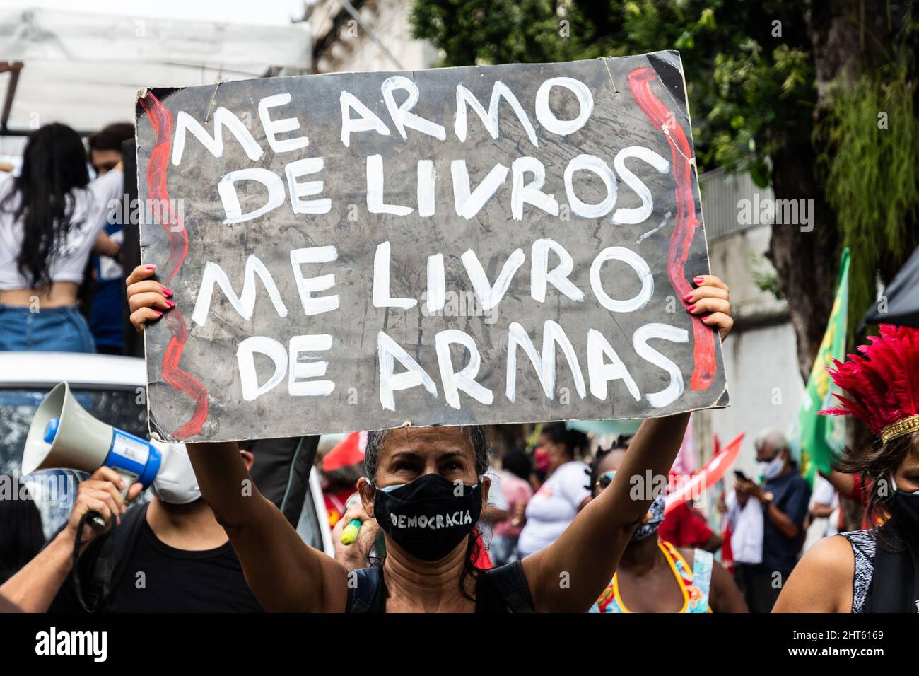 Group of people protesting against the government with banners, posters ...