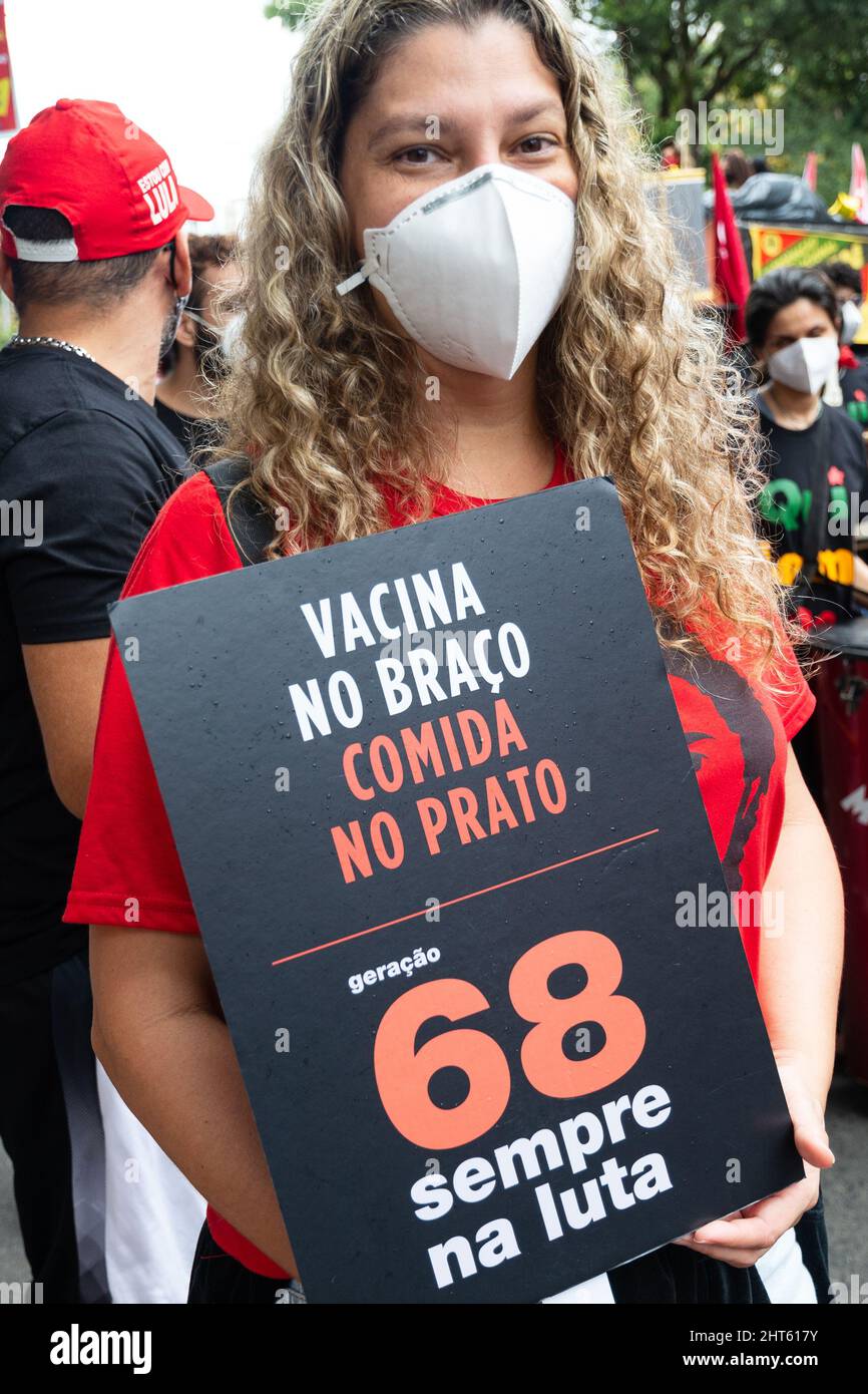 Group of people protesting against the government with banners, posters ...