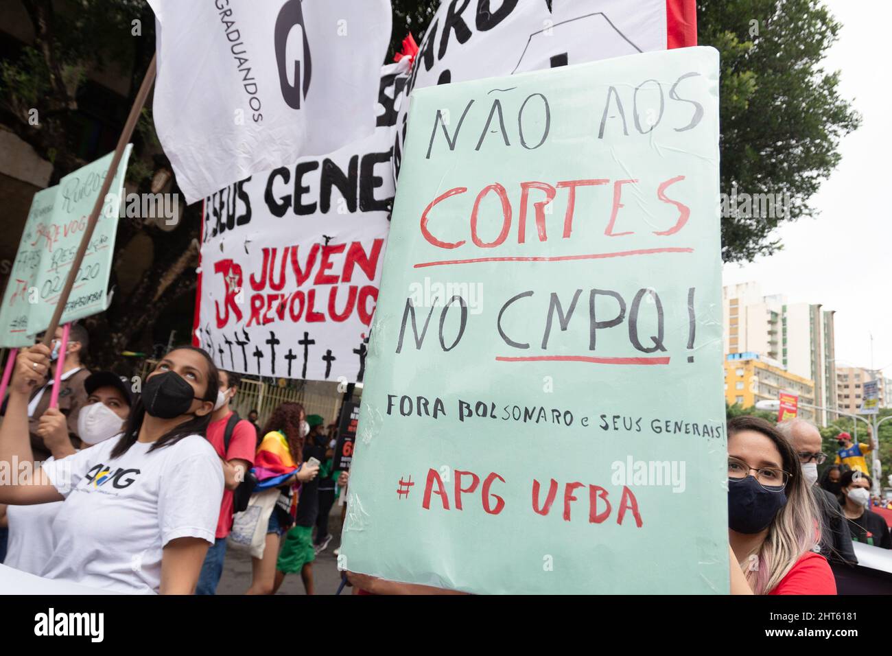 Group of people protesting against the government with banners, posters ...