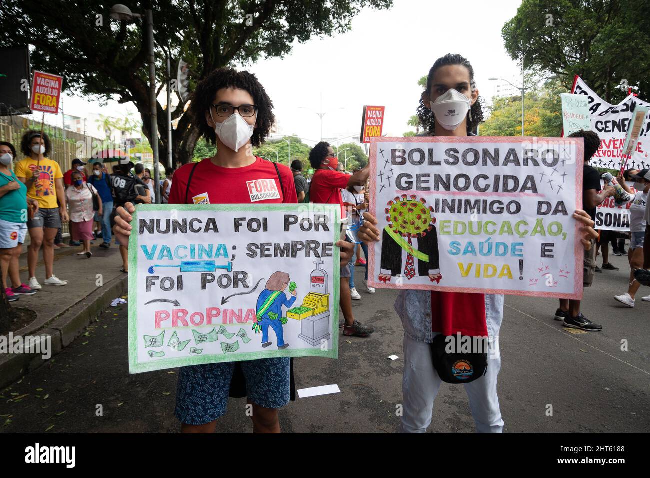 Group of people protesting against the government with banners, posters ...