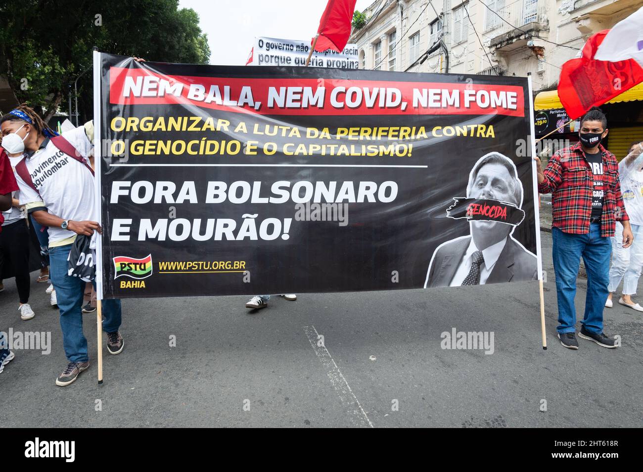 Group of people protesting against the government with banners, posters ...