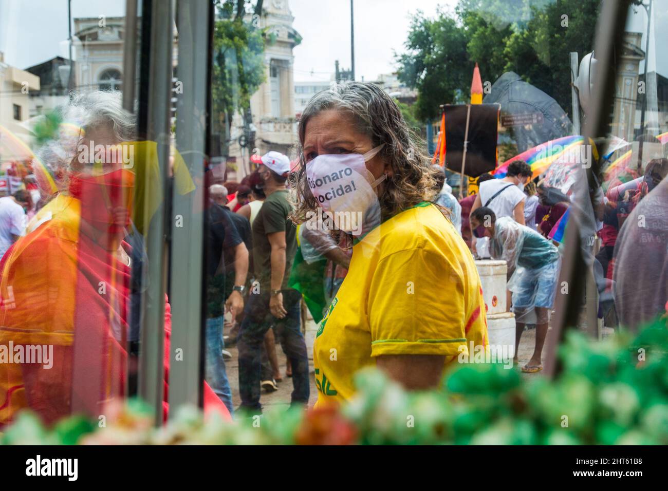Group of people protesting against the government with banners, posters ...