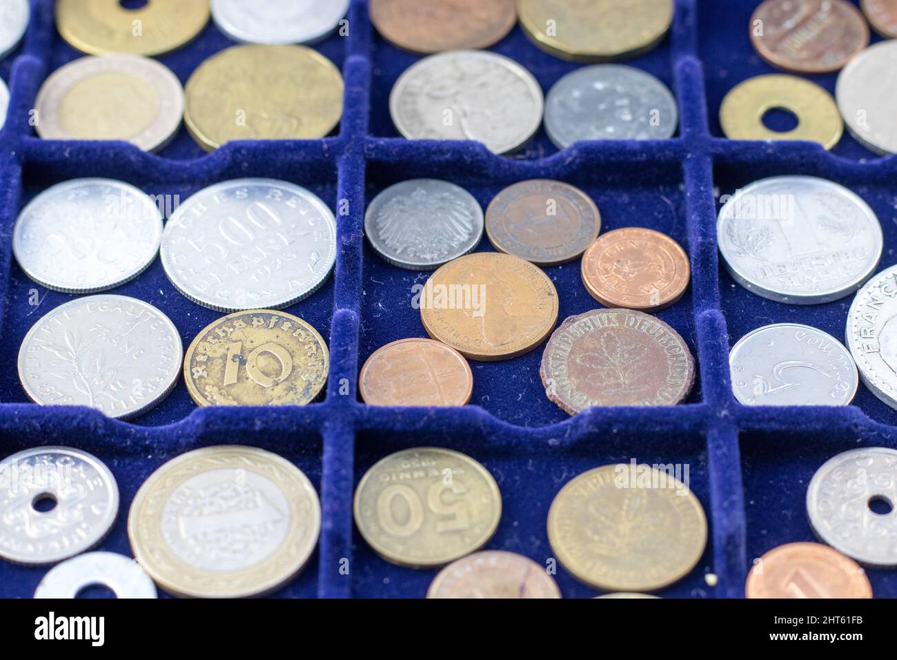 Old collected coins in a velour tray Stock Photo - Alamy