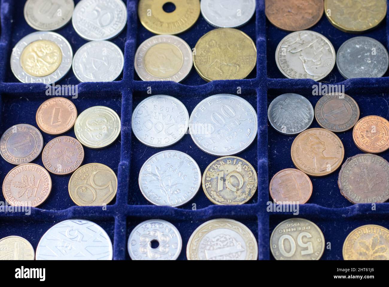 Old collected coins in a velour tray Stock Photo - Alamy