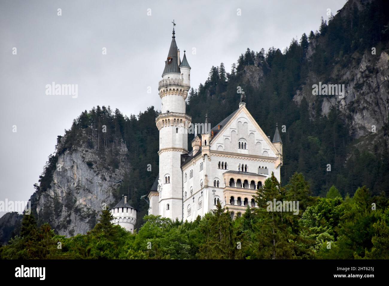 Beautiful shot of the Neuschwanstein Castle with a mountain on a ...