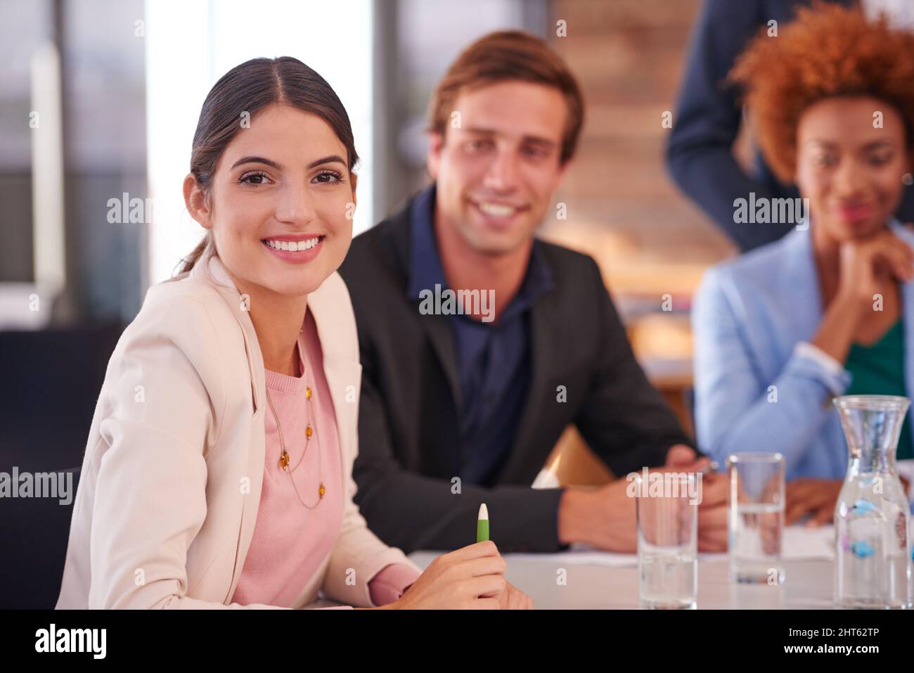 Were taking care of business. Cropped portrait of businesspeople in a ...