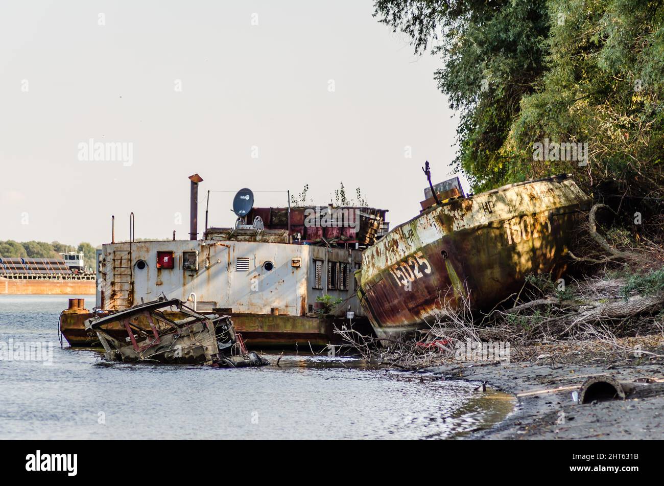 Stranded Old abandoned tanker wreck on the banksof the Danube River in ...