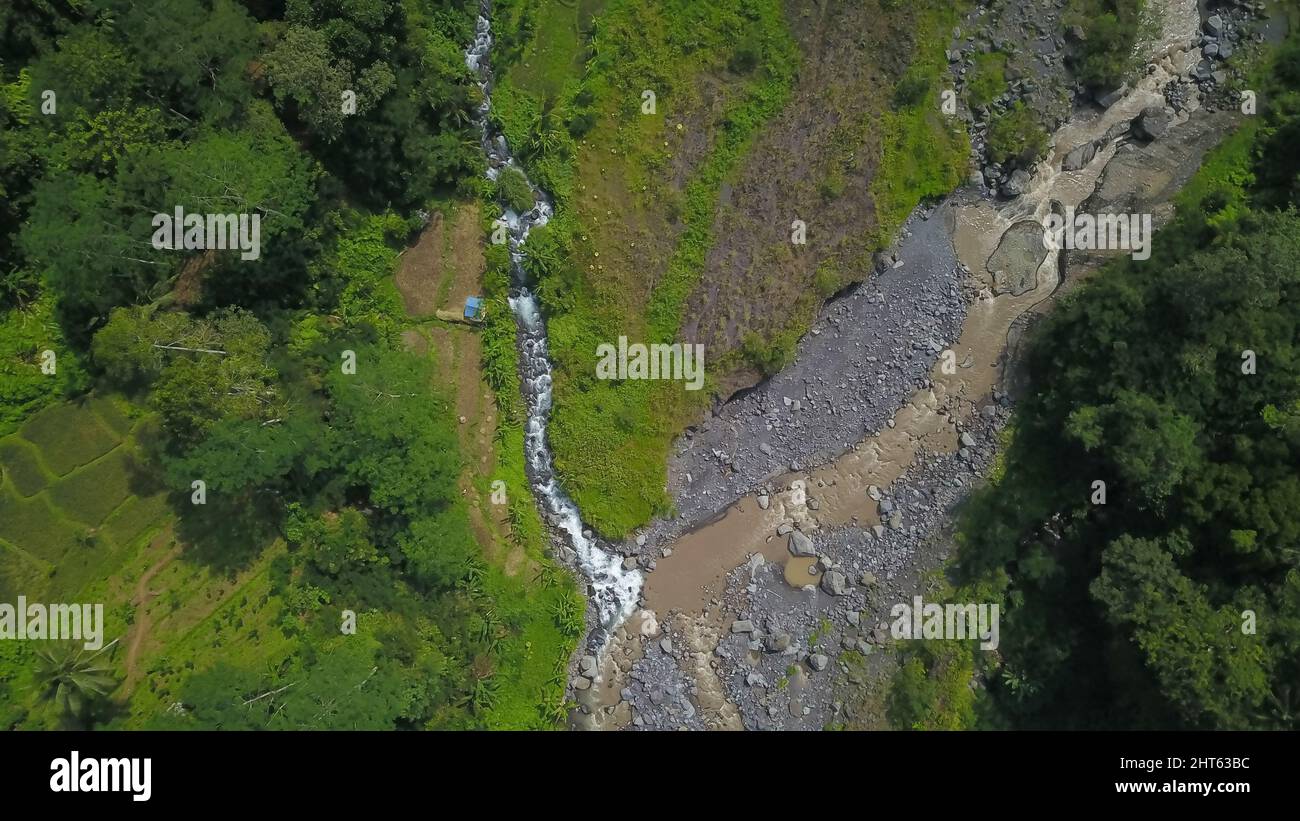 Stunning aerial view of the confluence of two large mountains rivers ...