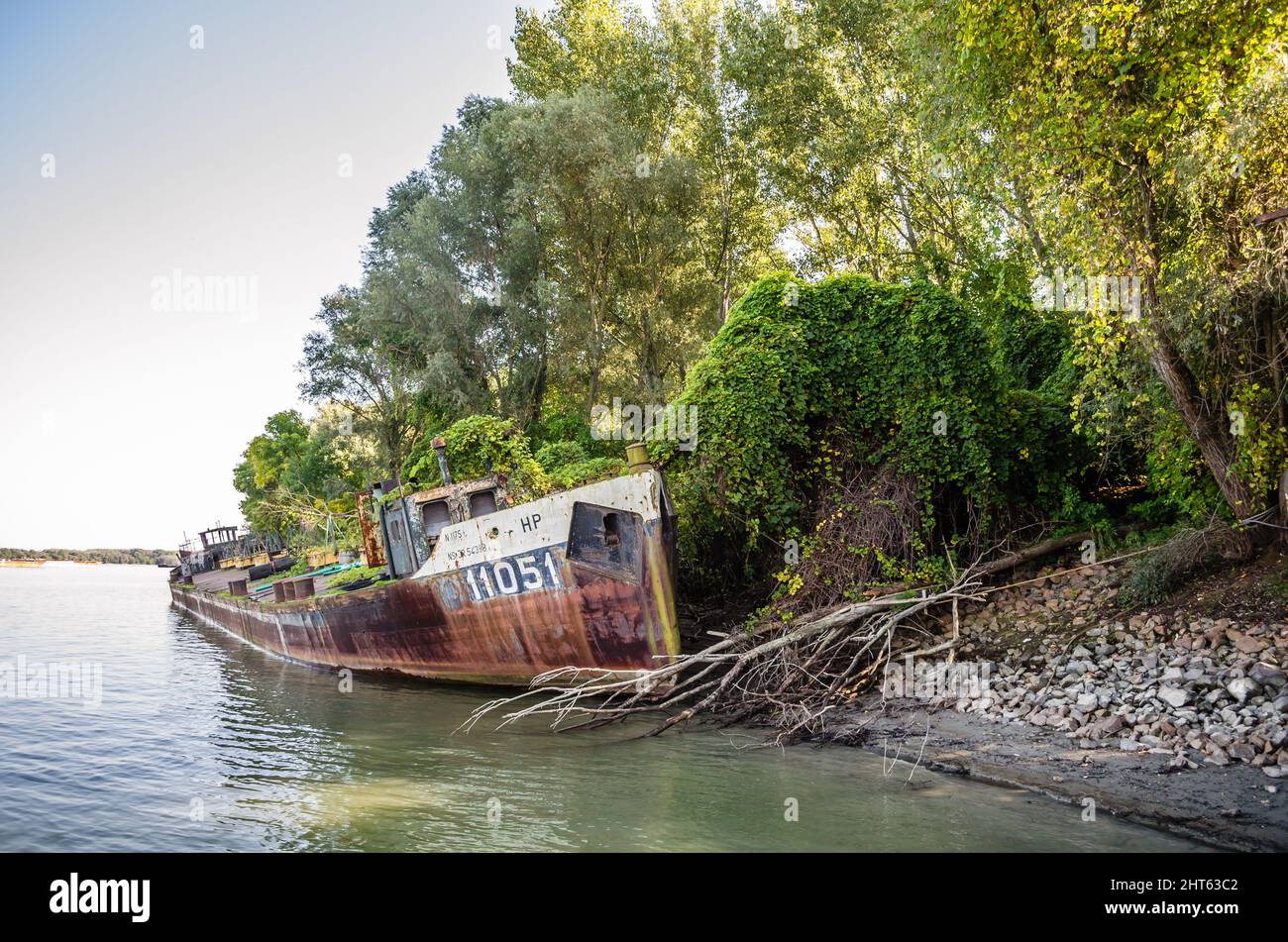 Stranded Old abandoned tanker wreck on the banksof the Danube River in ...