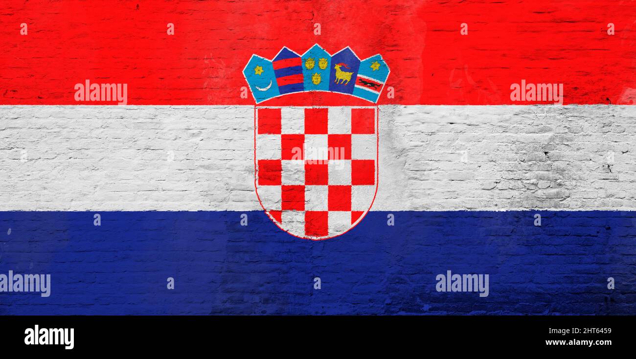 Full frame photo of a weathered flag of Croatia painted on a plastered ...