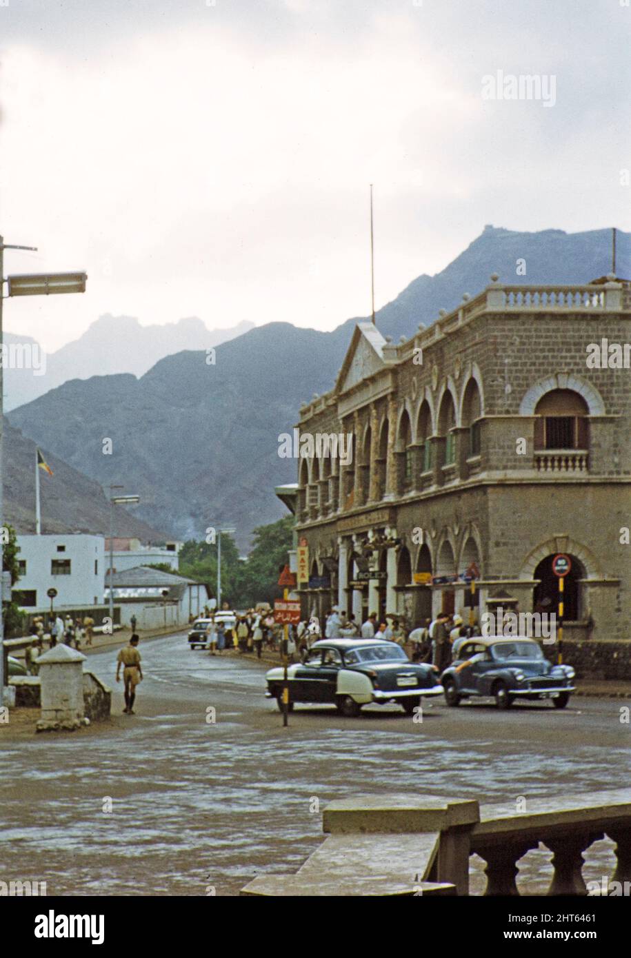 Vehicles and people shopping historic buildings, Aden, Yemen 1956 Stock ...