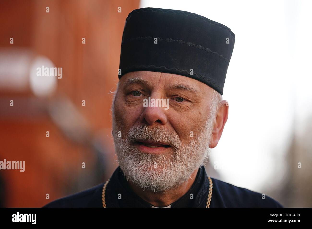 Bishop Kenneth Anthony Adam Nowakowski speaks to the media outside the ...