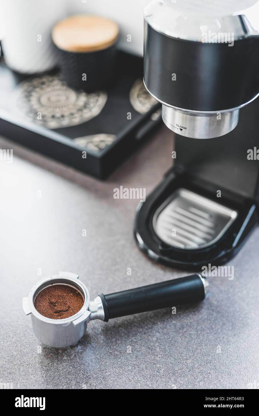 coffee machine pouring double espresso shot in clear coffee glass ...
