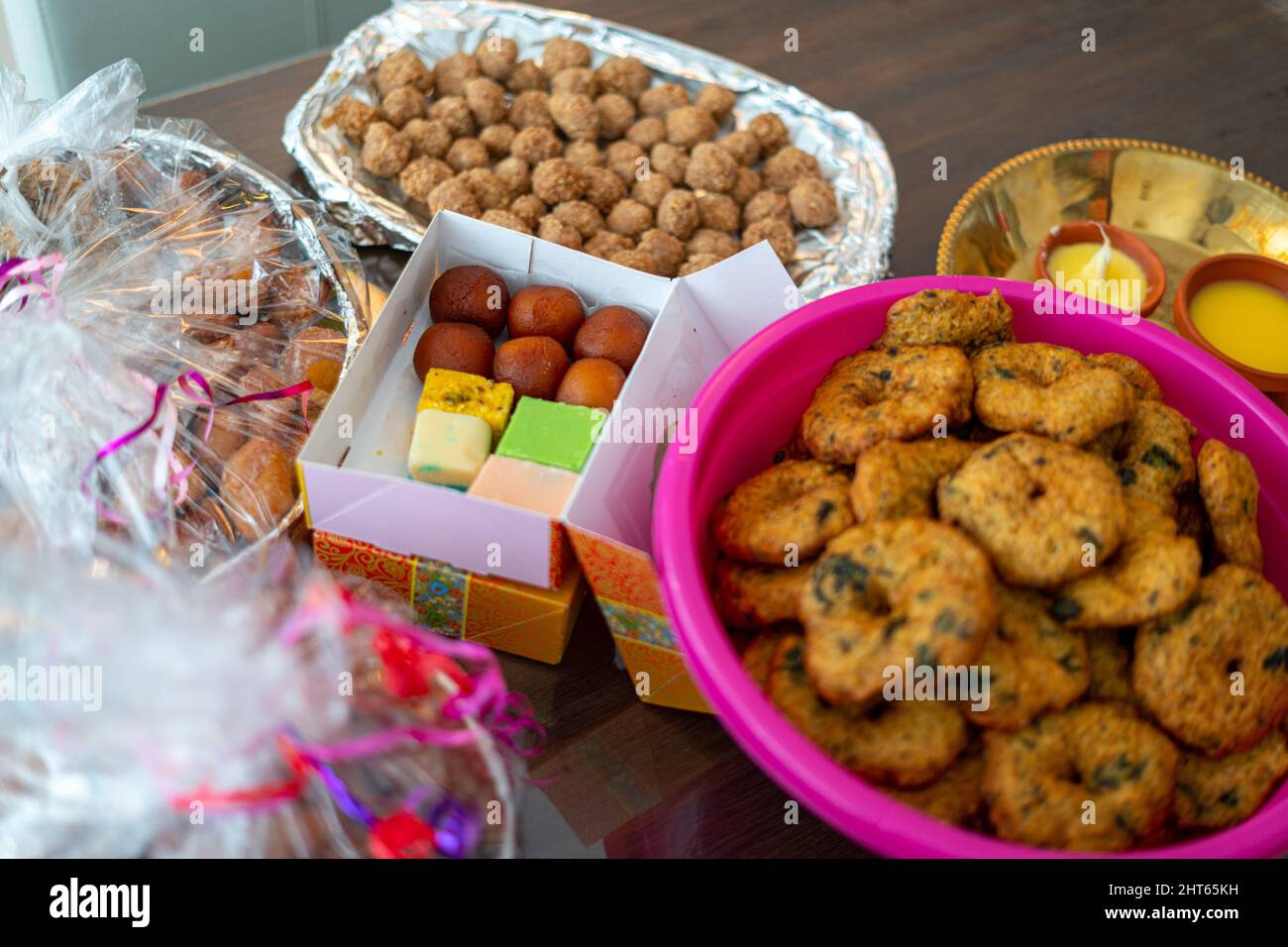 Closeup shot of the different delicious Indian sweets on the tabl Stock ...