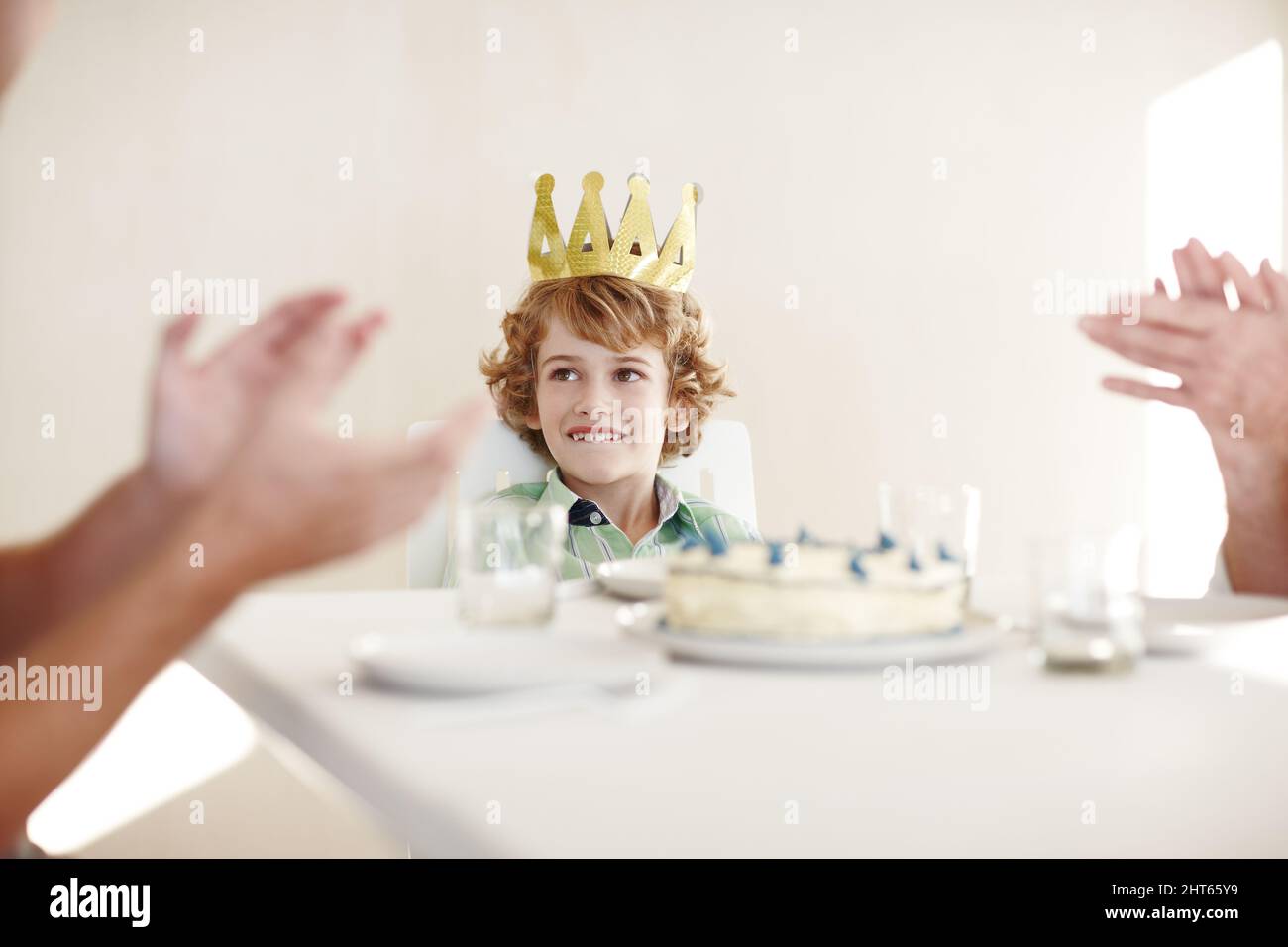 The king loves the attention. Shot of two people clapping hands for the ...