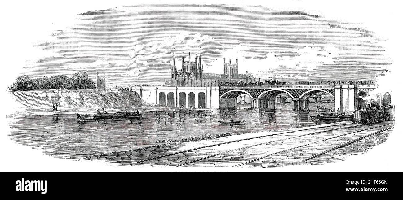 The Line at Peterborough, [in Cambridgeshire], 1850. Steam train ...