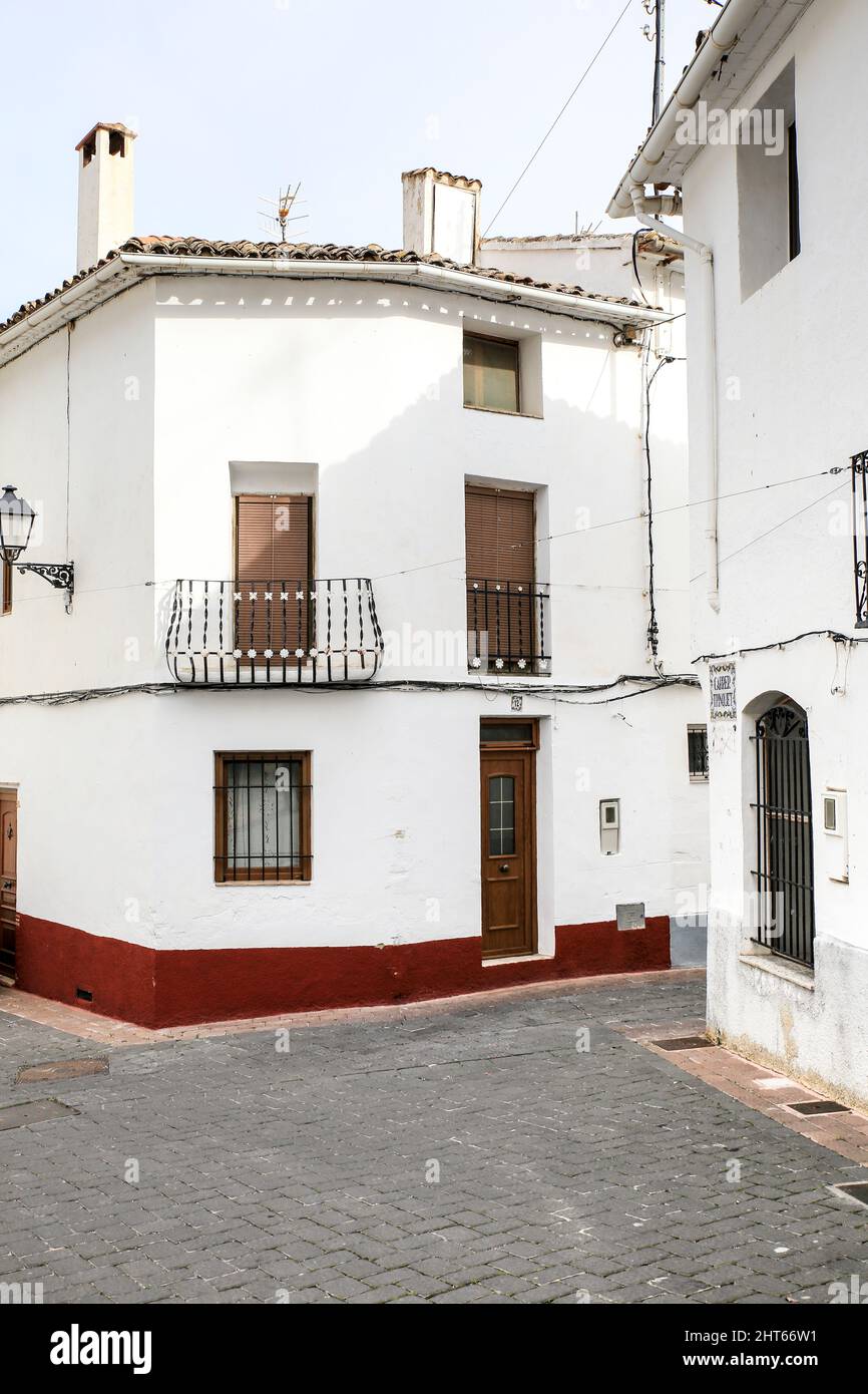 Bolulla, Alicante, Spain- February 4, 2022: Narrow Street and typical ...