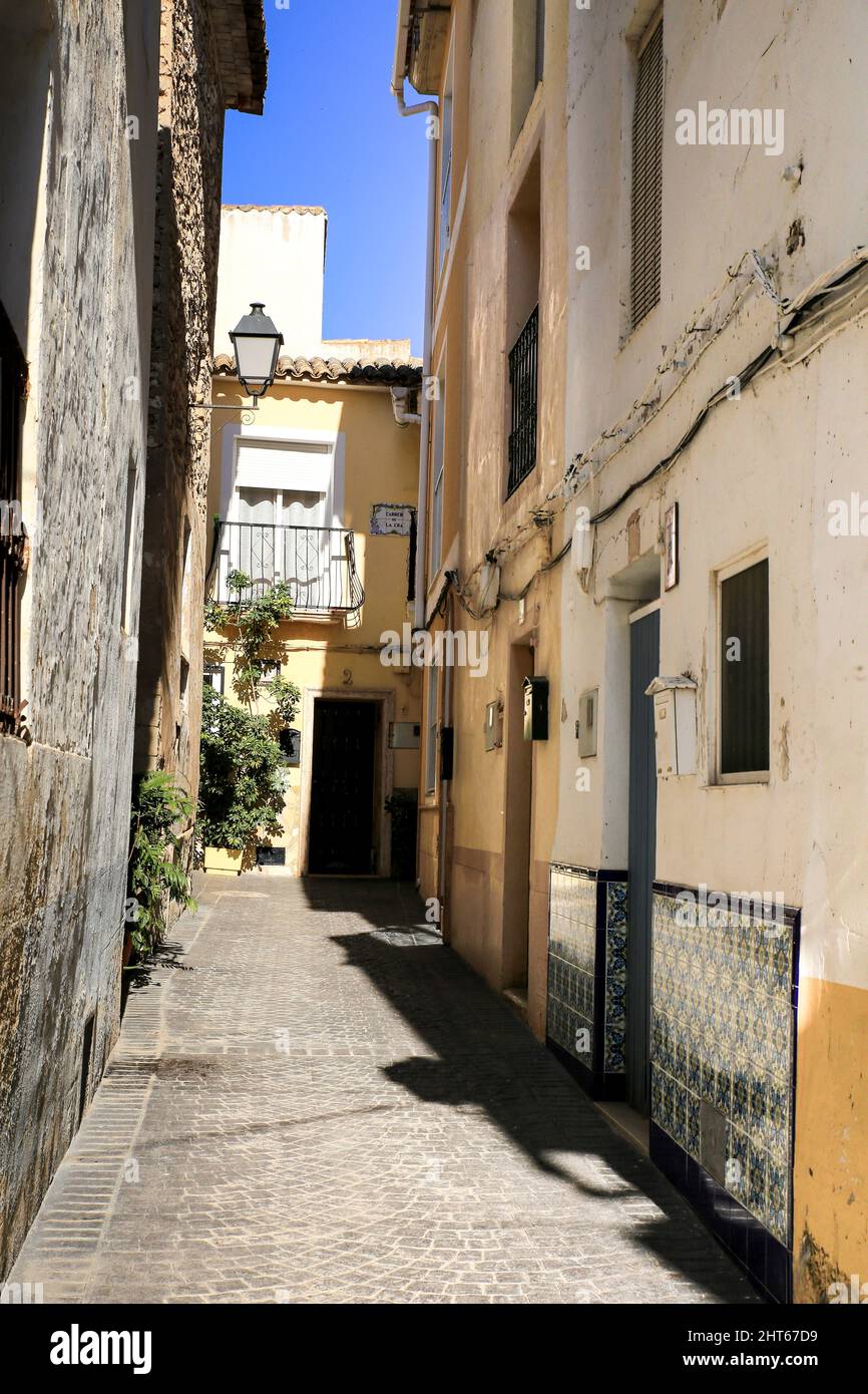 Bolulla, Alicante, Spain- February 4, 2022: Narrow Street and typical ...