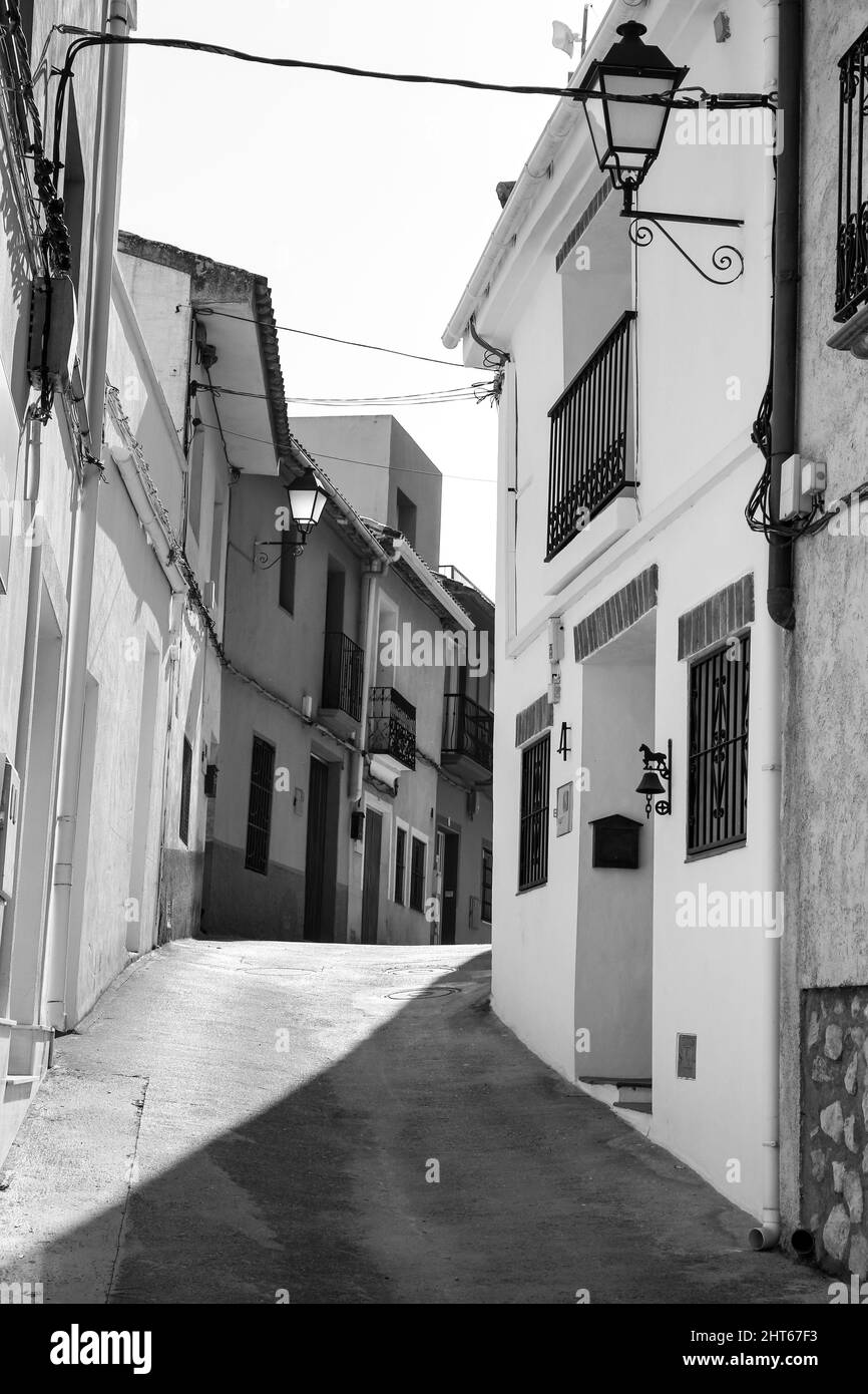 Bolulla, Alicante, Spain- February 4, 2022: Narrow Street and typical ...