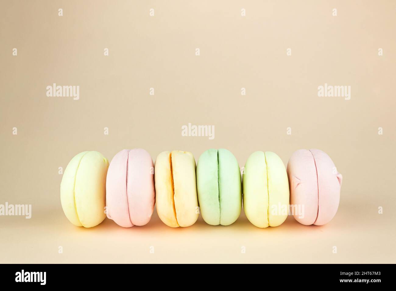 Multi Colored Stacked marshmallows looks like French Macarons on pastel ...