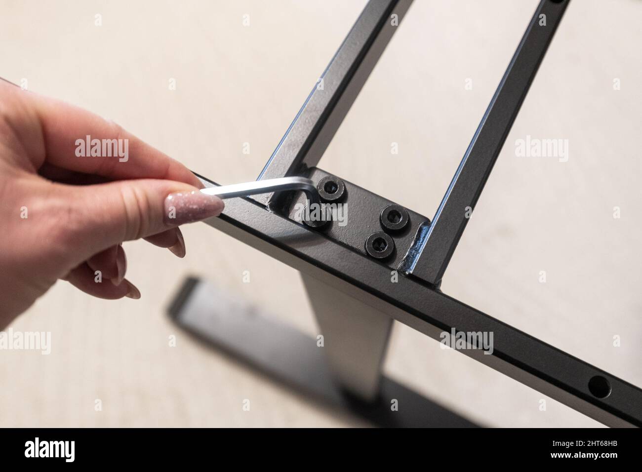 The allen key on metal profile Stock Photo - Alamy