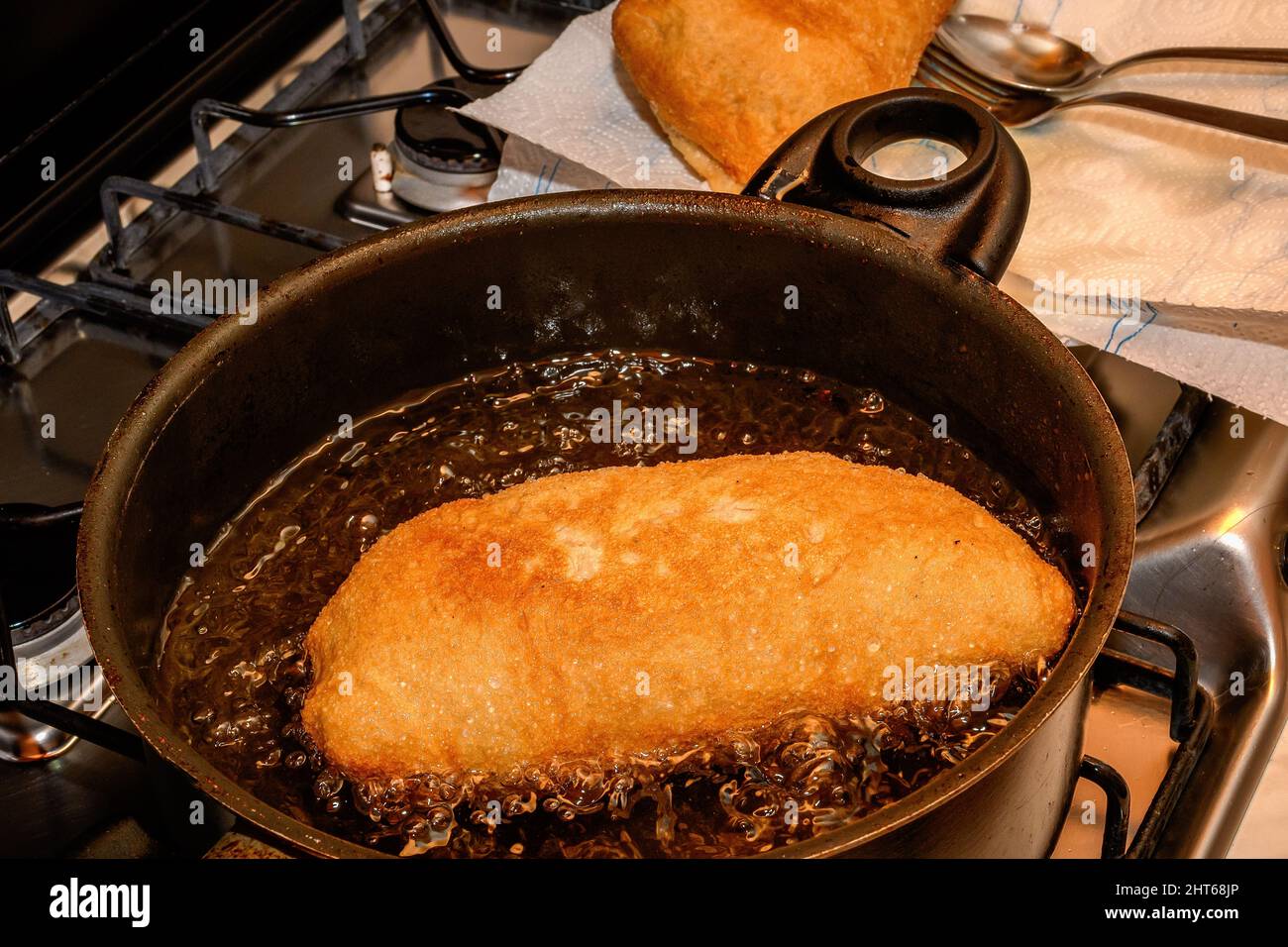 Homemade Neapolitan Fried Pizza While Cooking Stock Photo - Alamy