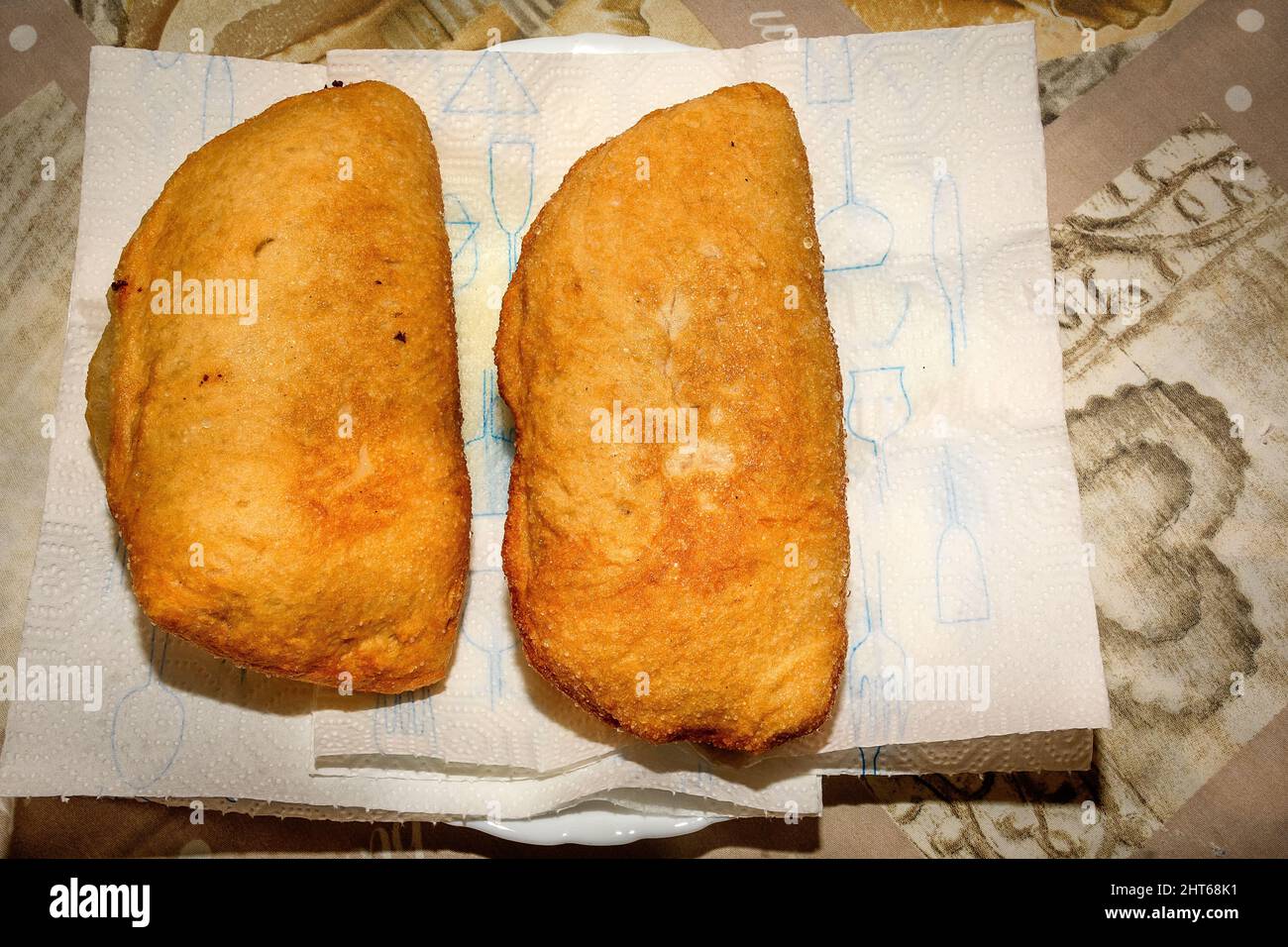 Two Homemade Traditional Fried Pizzas Stock Photo - Alamy