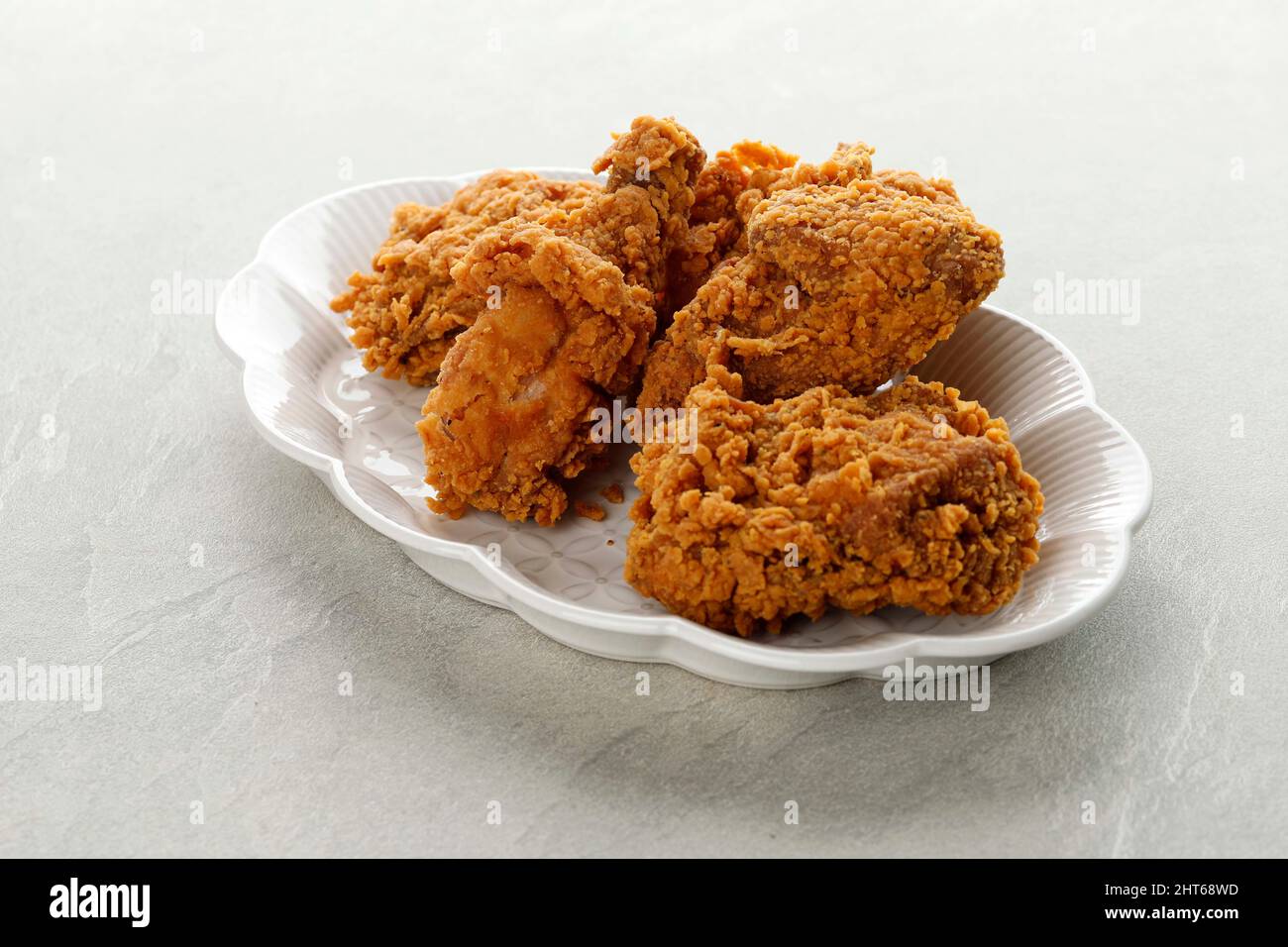 Crispy Kentucky Fried Chicken on Oval Plate in a White Background Stock ...