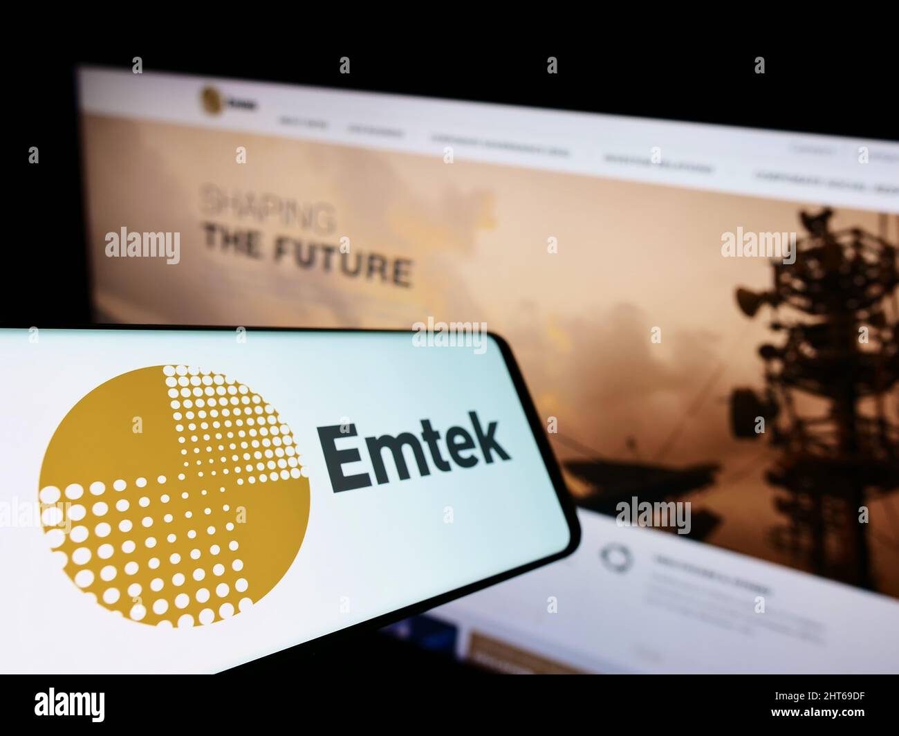 Smartphone with logo of company PT Elang Mahkota Teknologi Tbk (Emtek ...