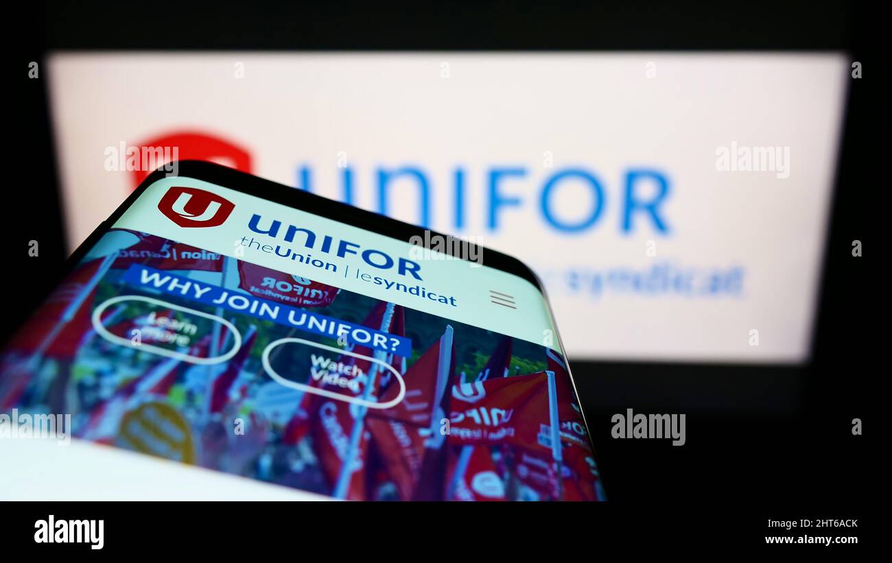 Mobile phone with website of Canadian general trade union Unifor on ...