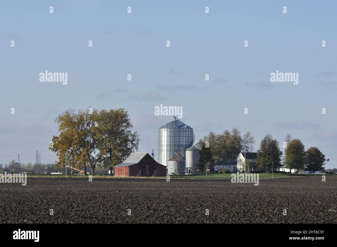 Rural Missouri farm scene, with a house, barns, and grain bins Stock ...