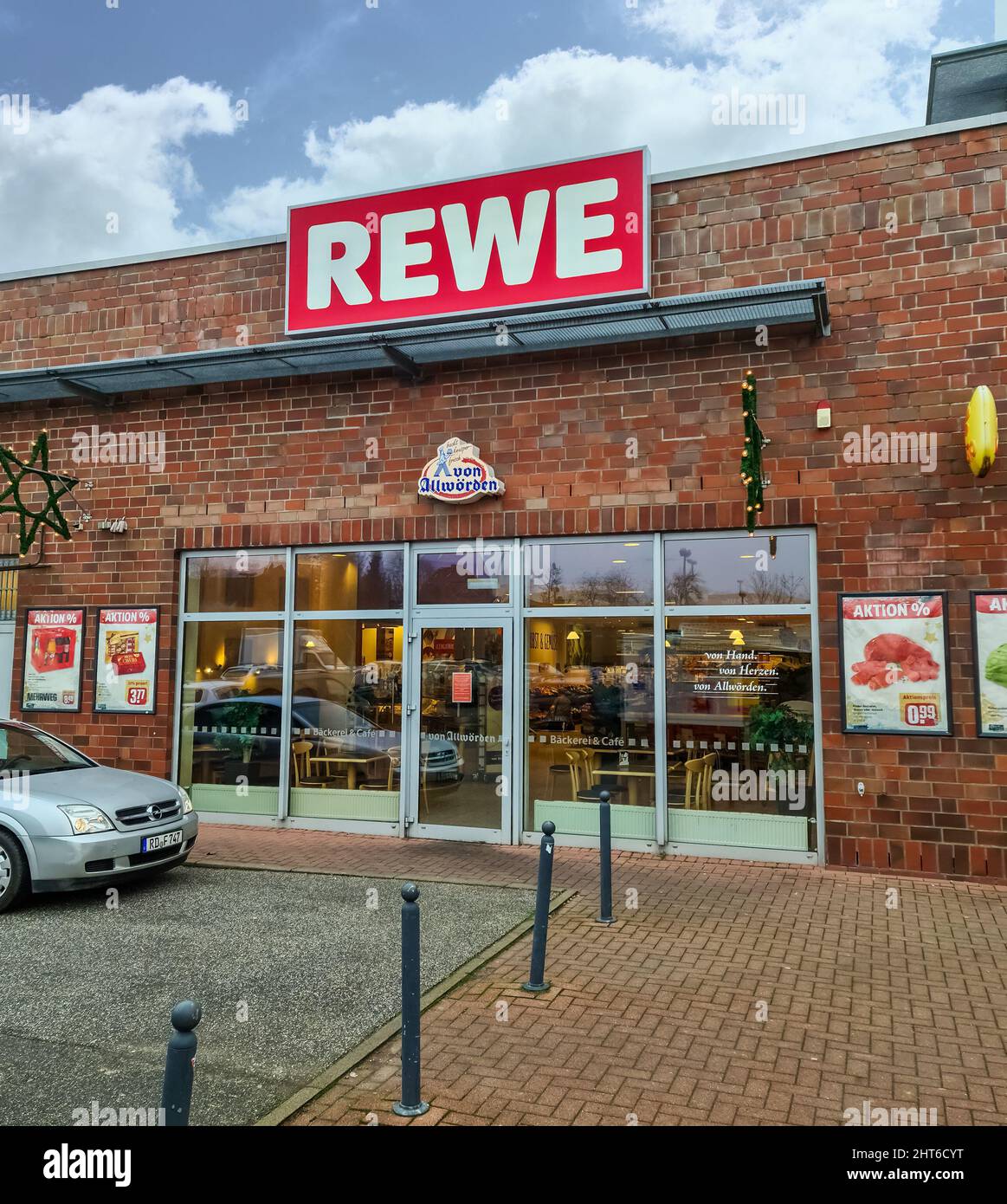 Photo of the entrance area of a supermarket of the REWE Group in ...