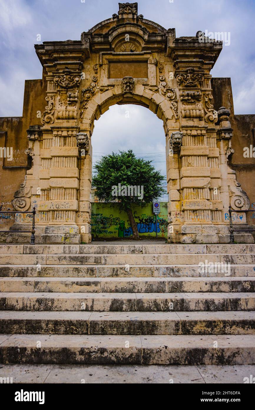 Beautiful view of an arch of a temple under the blue sky Stock Photo ...
