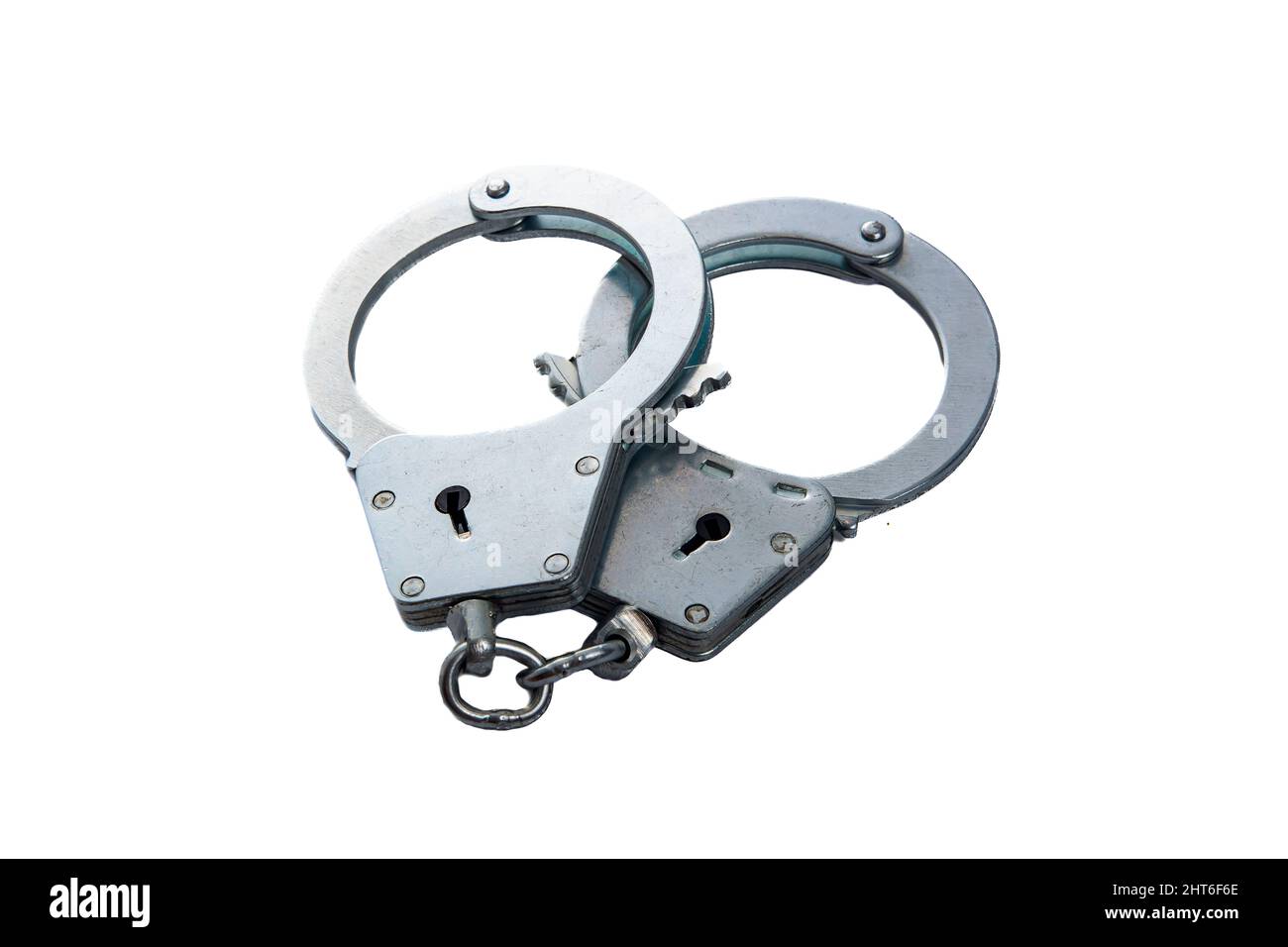 Metal handcuffs on a white isolated background Stock Photo - Alamy