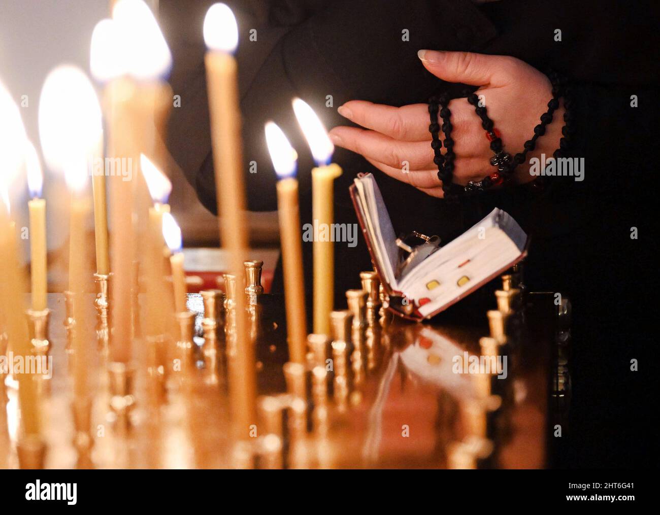 27 February 2022, Baden-Wuerttemberg, Baden-Baden: Candles burn during ...
