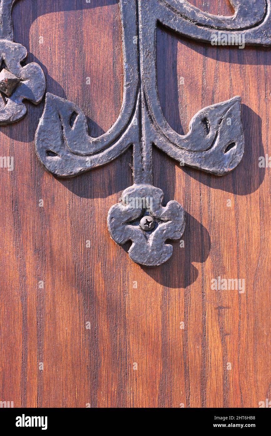 Wrought iron vintage door hinge with a beautiful floral motif Stock ...